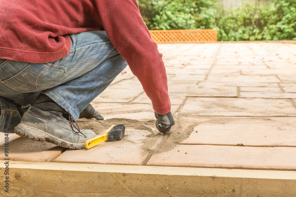 Pointing a patio with dry grouting cement grouting mix Stock Photo ... Pointing a patio with dry grouting cement grouting mix Stock Photo ...