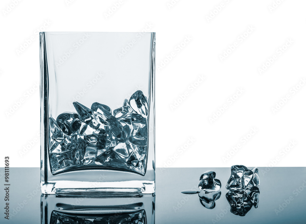 Empty glass with ice cubes on the mirror surface. Painted image ...