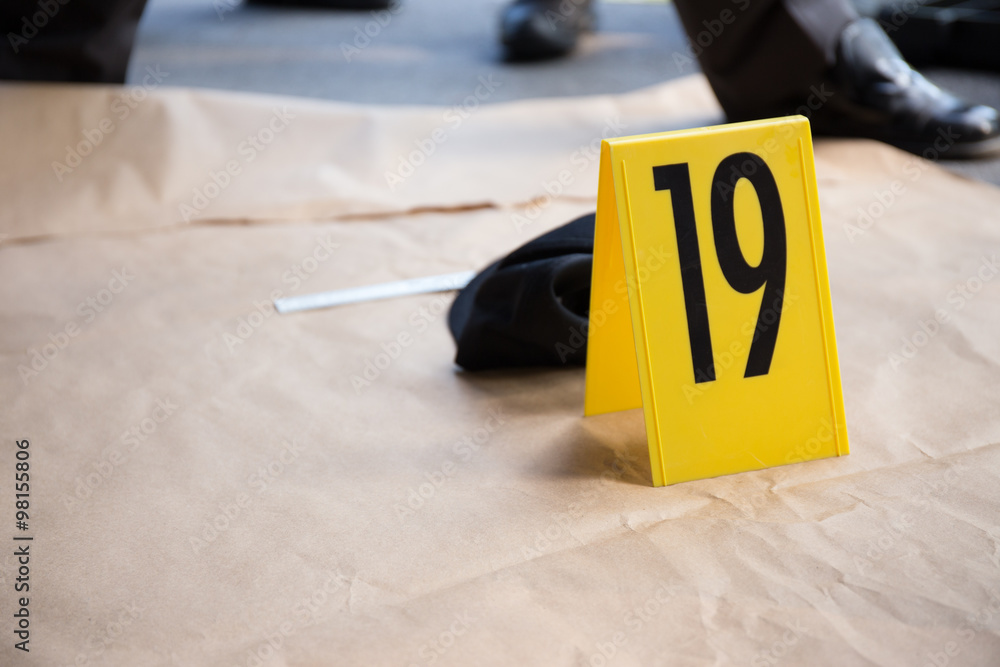 evidence number tag in crime scene Stock Photo | Adobe Stock
