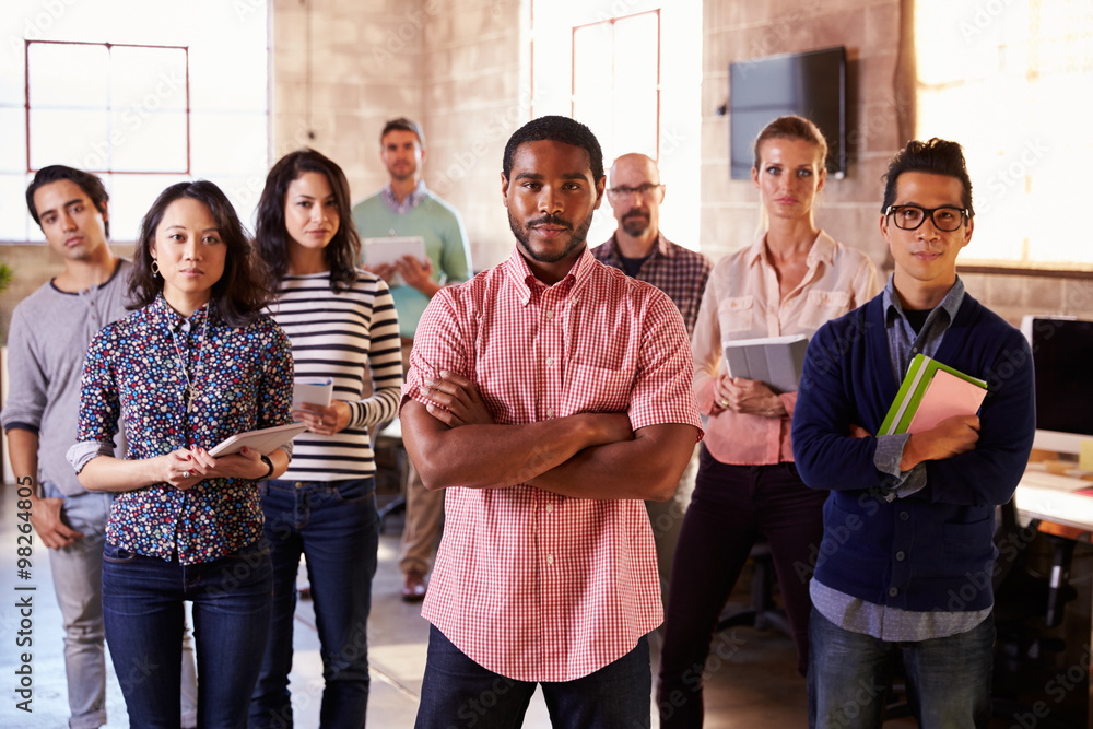 Portrait Of Staff Standing In Modern Design Office Stock 写真 | Adobe Stock