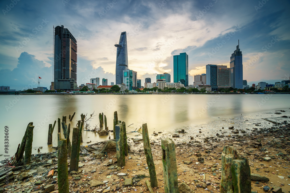 Cityscape of Ho Chi Minh city at sunset (HDR), viewed over Saigon river ...