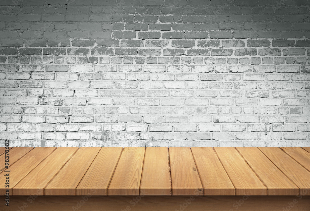 Wood table with White brick wall background Stock Photo | Adobe Stock