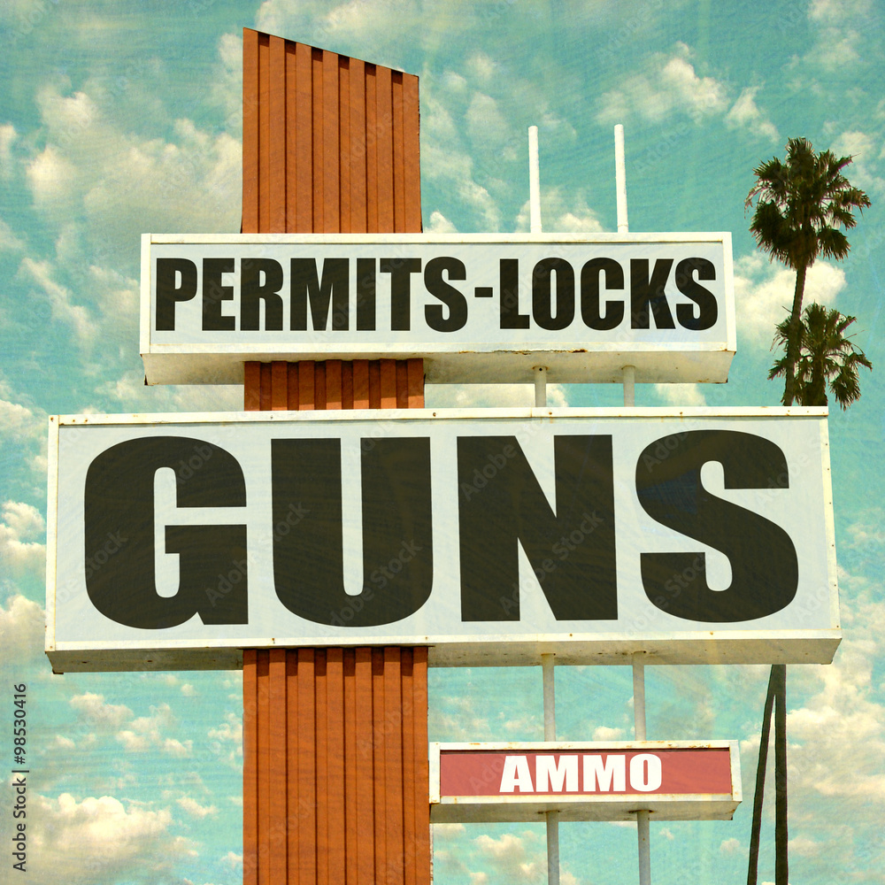 aged and worn vintage photo of gun shop sign with palm trees Stock ...