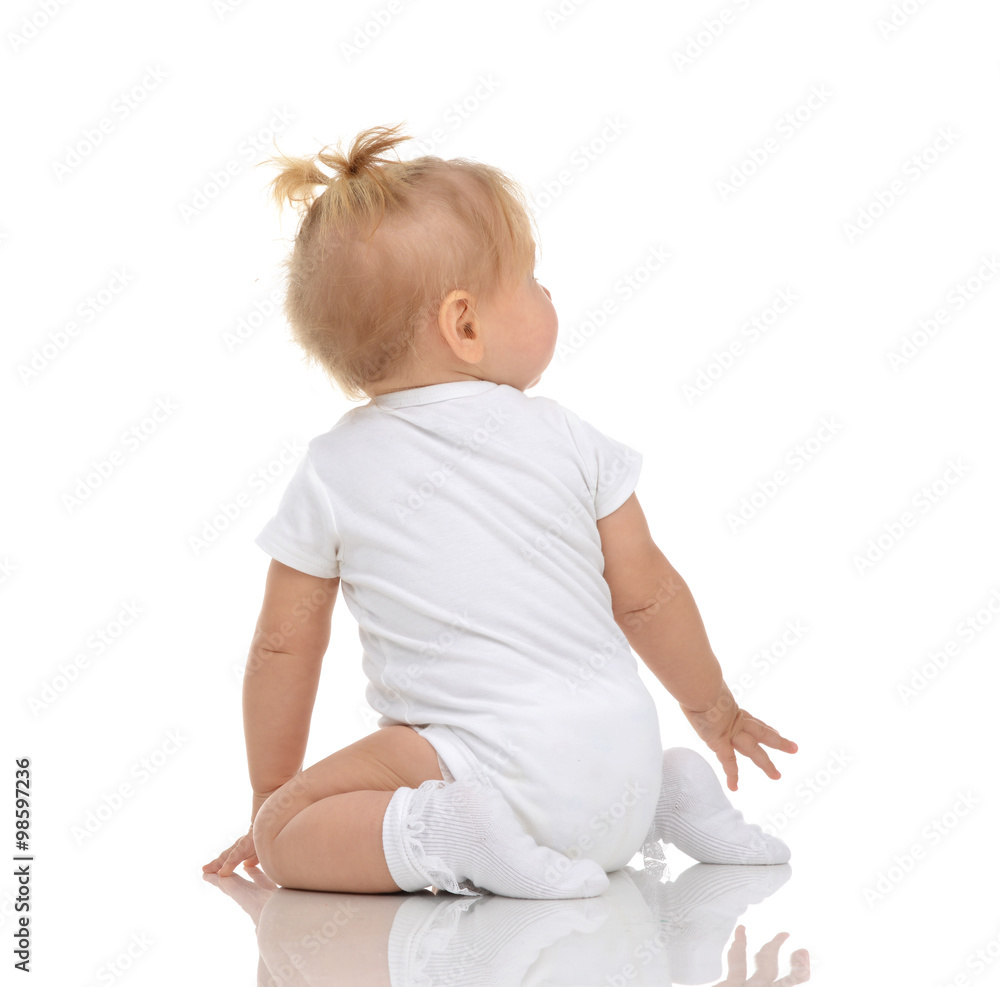 Infant child baby toddler sitting backwards back wiev and lookin Stock ...