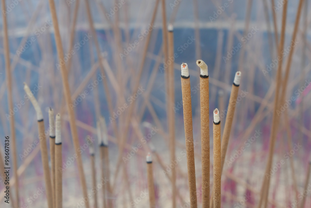 The joss sticks burning in big joss stick pot at the Chinese temple ...