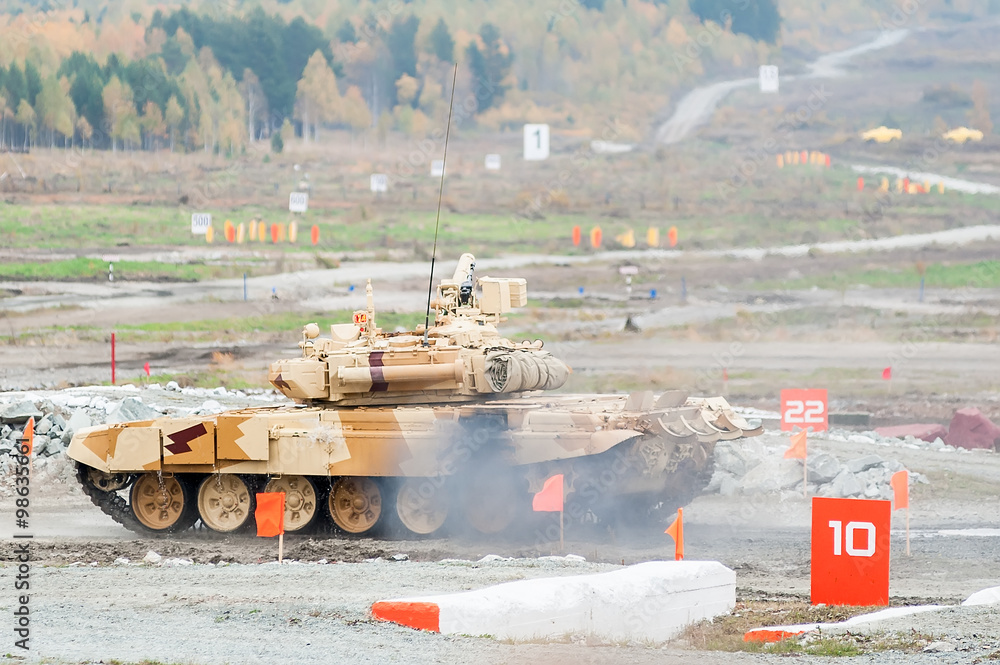 Tank T-90S moves with turret turned back Stock Photo | Adobe Stock