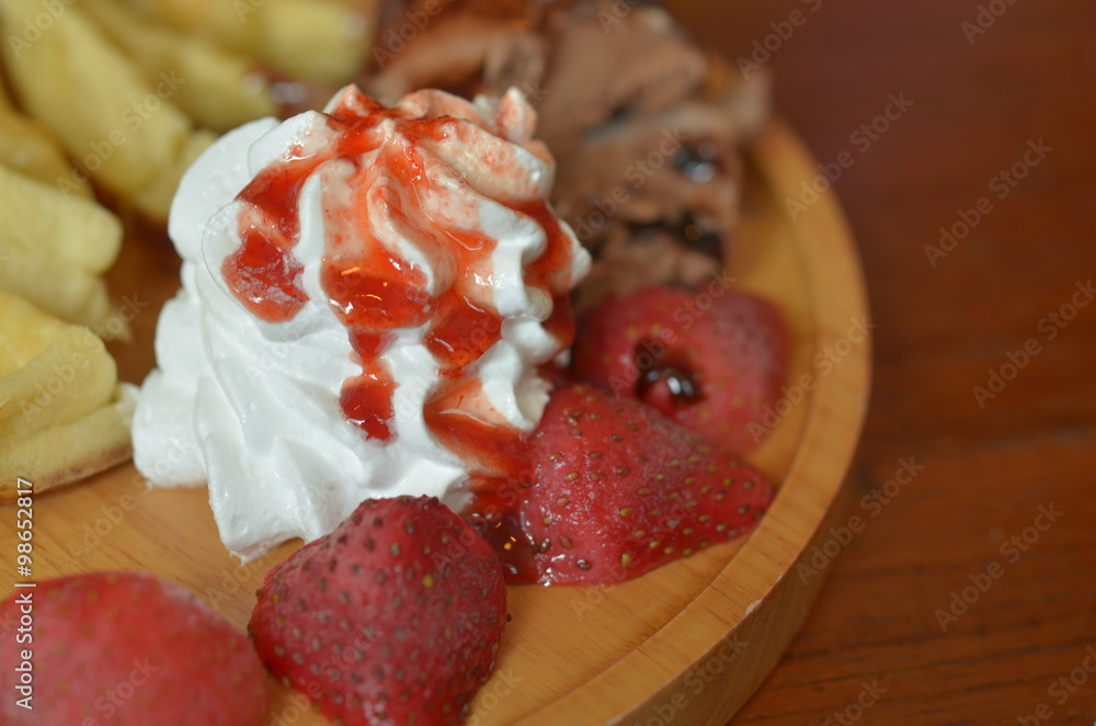 stawbarry yam on weep cream Stock Photo | Adobe Stock