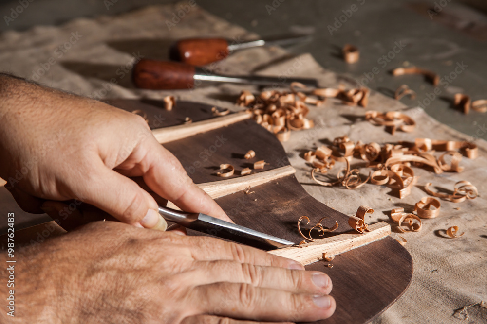 Luthier making top of guitar Stock Photo | Adobe Stock