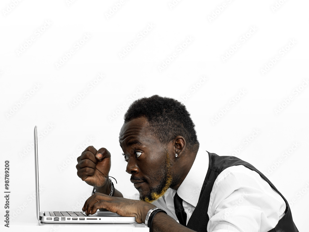 Businessman portrait waiting for good news while looking at lapt Stock ...