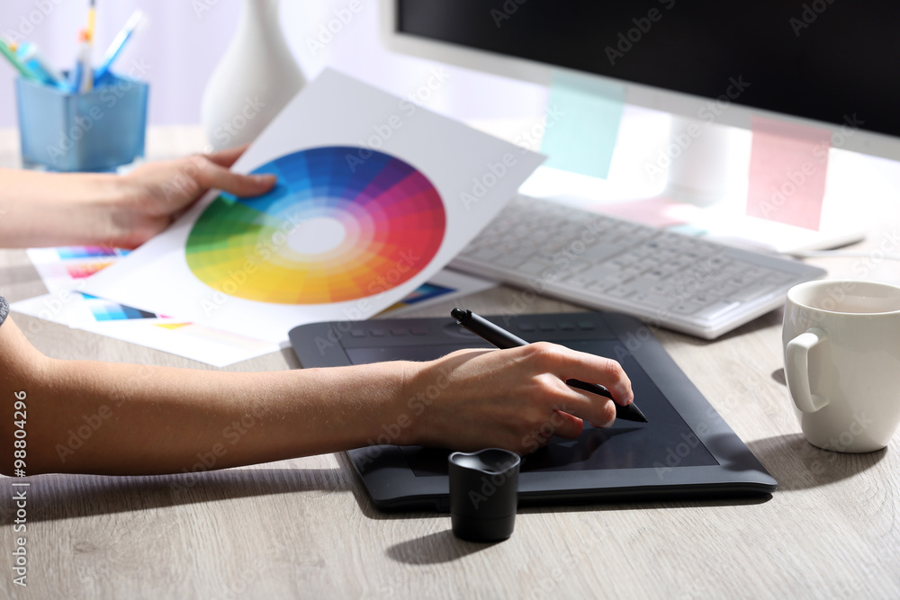 Female hand drawing on the graphic tablet in the office, close-up Stock ...