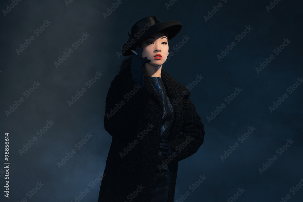 Retro 1940 asian fashion woman. Smoking cigarette. Wearing hat. Stock ...
