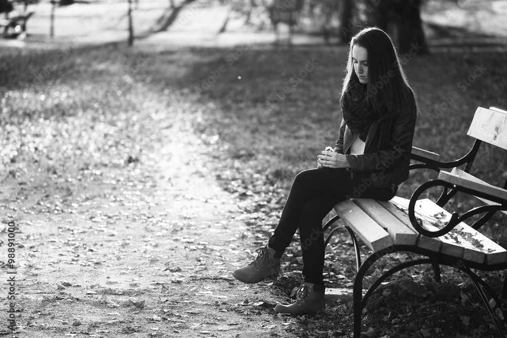 Sad lonely woman on bench Stock Photo | Adobe Stock