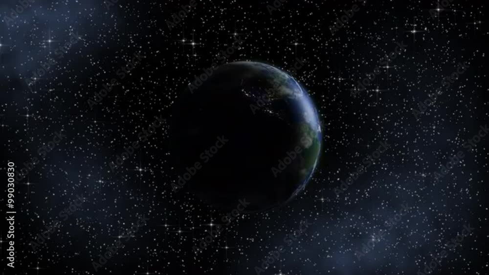 Planet Earth revolving against a background of stars. City lights can ...