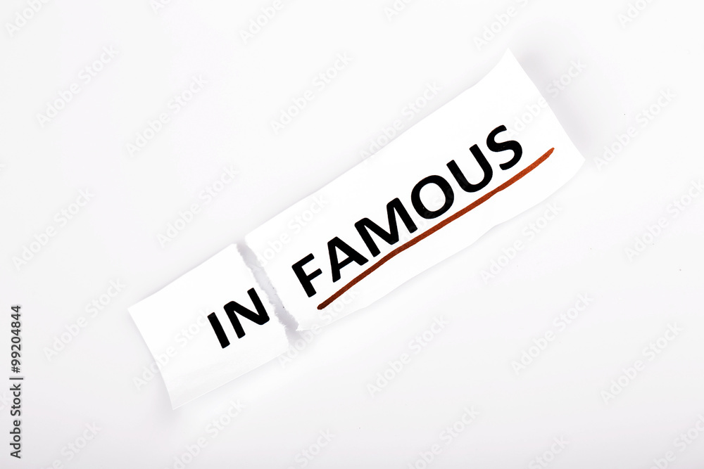 Poster The word infamous changed to famous on torn paper – Wall Art ...