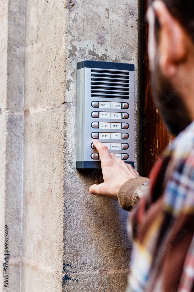 Man ringing the doorbell Stock-Foto | Adobe Stock