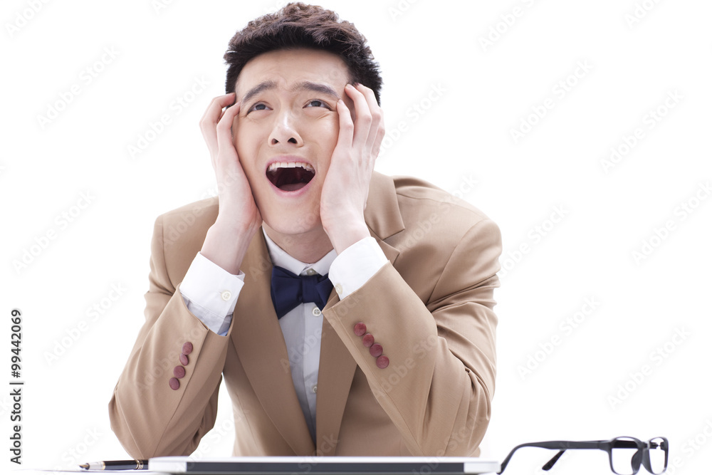 Frustrated young businessman shouting Stock-Foto | Adobe Stock