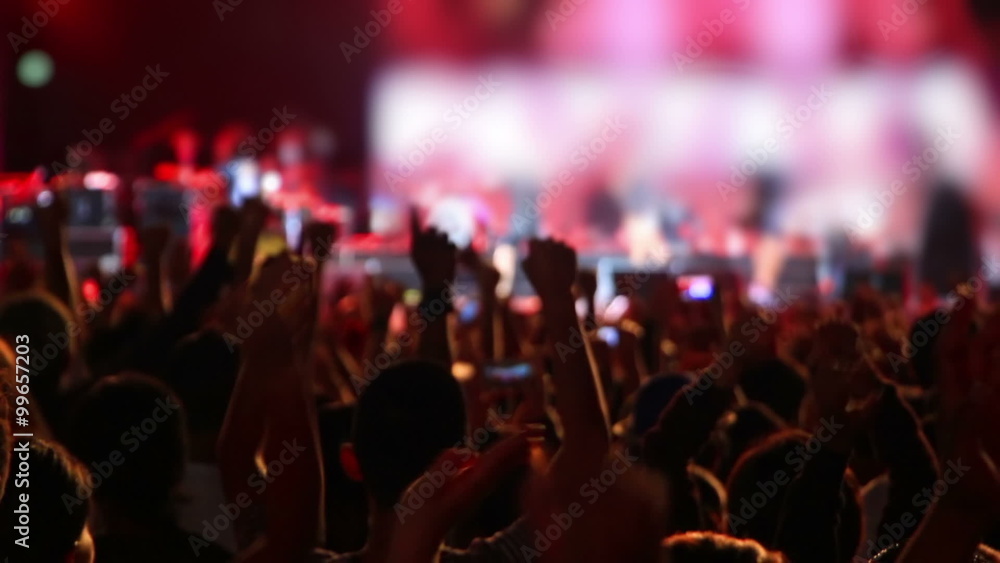 Crowd of people raising hands up at rock concert Stock Video | Adobe Stock