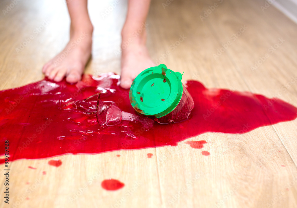 child sweet tooth dropped and smashed a jar of jam. glass jar of jam ...