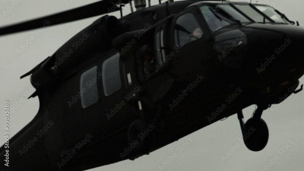 Close up shot of Black Hawk helicopter approaching landing site. Stock ...