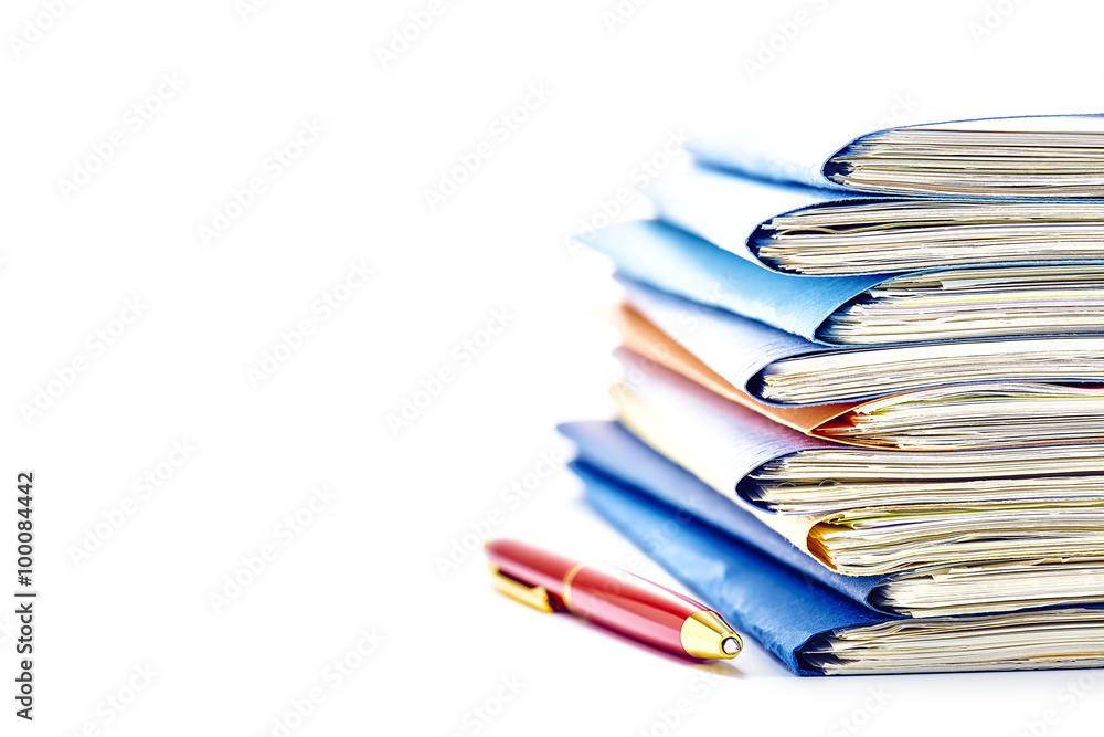 Stacked files. On white background with copy space on the left side ...