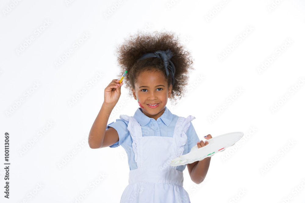 african child drawing with a brush Stock-Foto | Adobe Stock