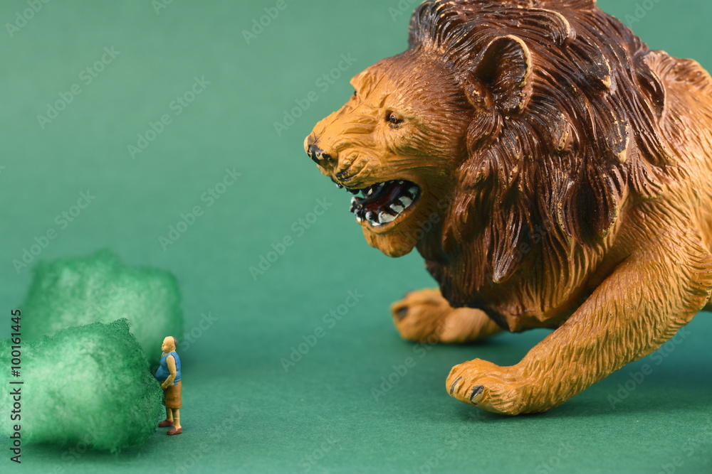 Miniature Concept: A Large Toy Lion Creeping Up On An Oblivious, Tiny ...