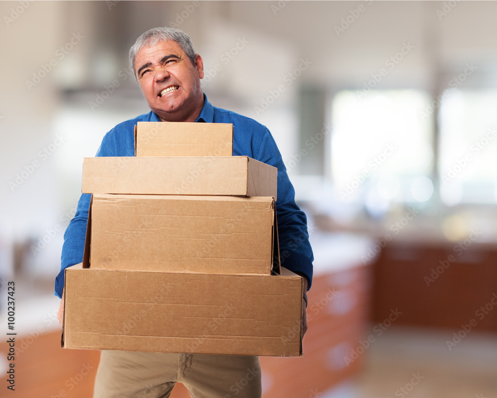 man with boxes Stock Photo | Adobe Stock