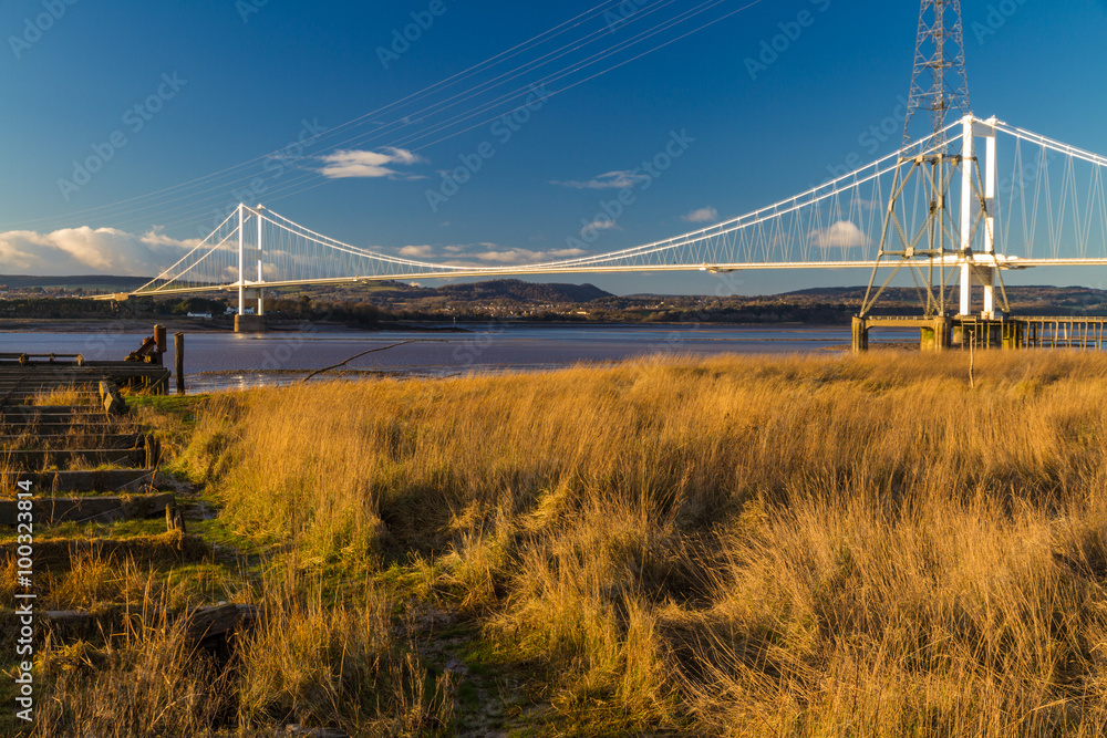 Remains of Aust Ferry pier with Severn Bridge in the distance Stock ...