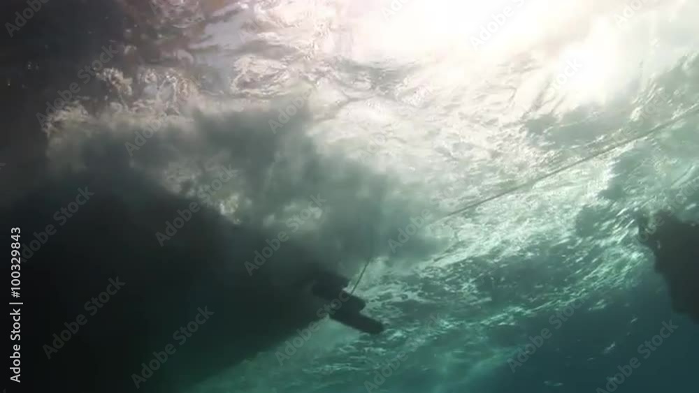 Bottom of boat out of water on background of sun. Amazing, beautiful ...