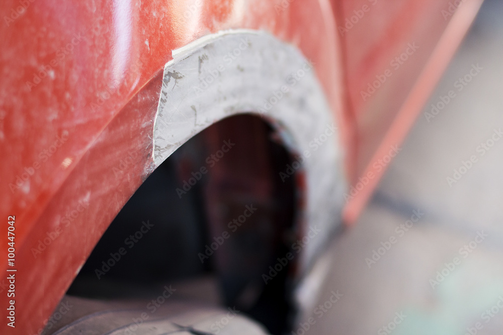 Parts of a car after an accident, fixing work ongoing. Repair shop cars ...