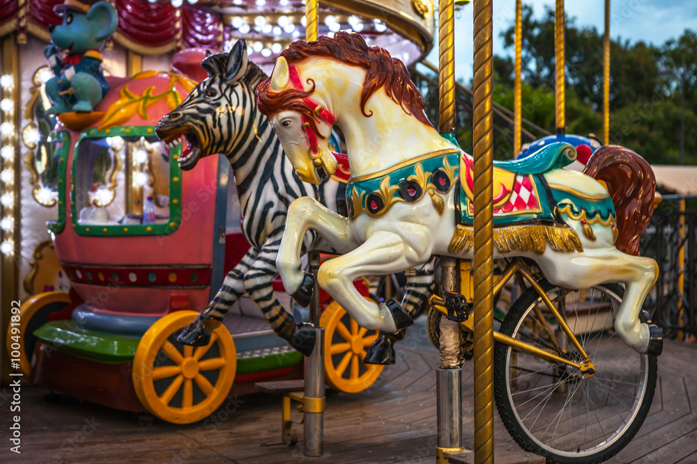 PARIS, FRANCE - AUGUST 30, 2015: Old French carousel in a holiday park ...
