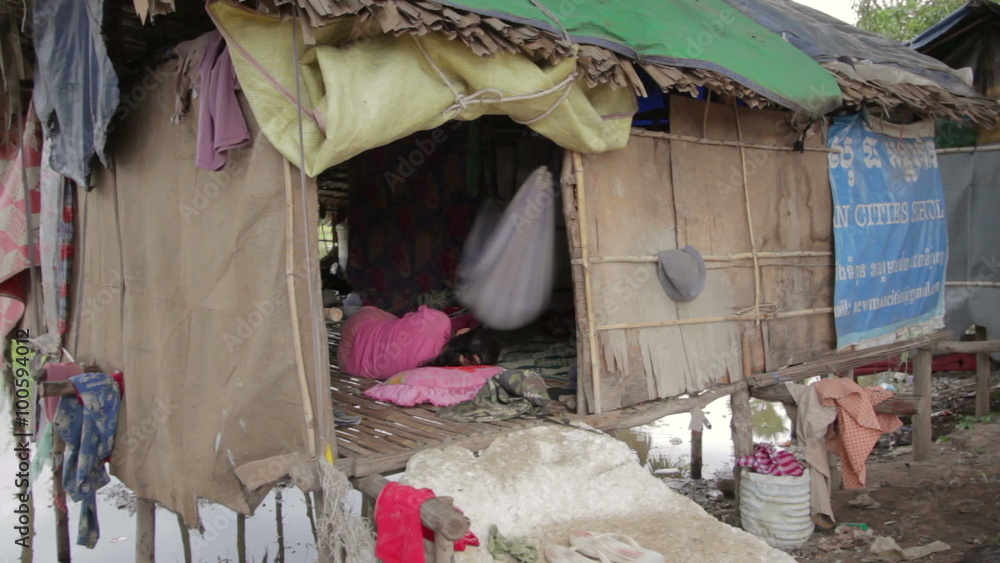 Cambodian family in slum, inside shack Stock Video | Adobe Stock