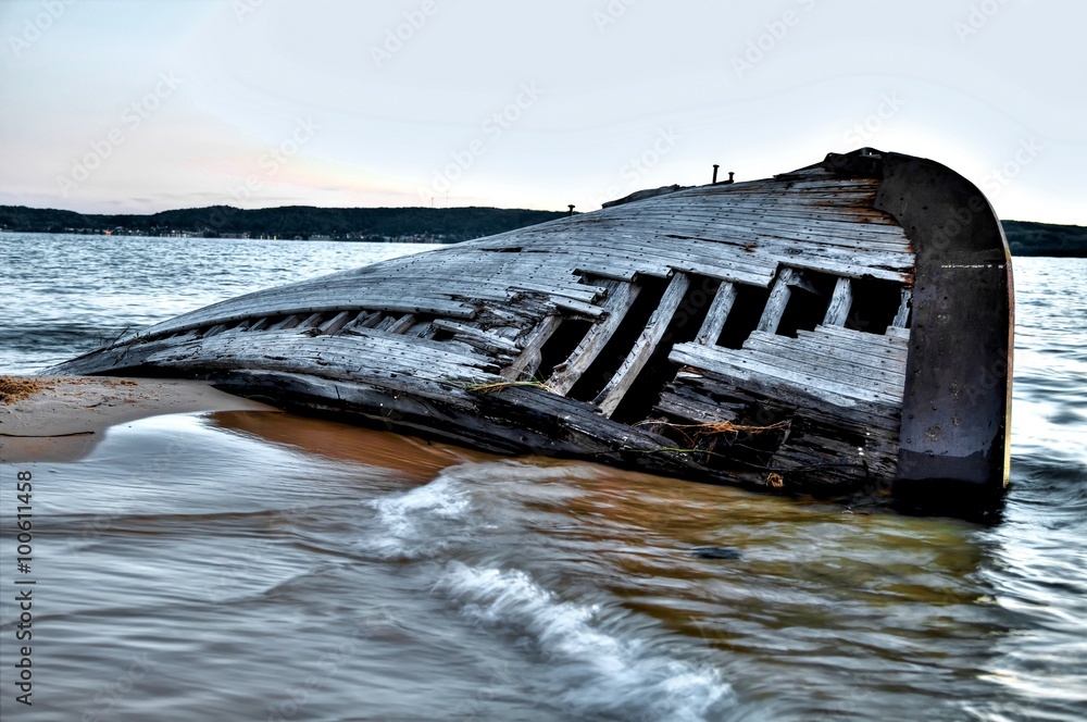 Stranded. Beached wooden shipwreck on the shores of Lake Superior in ...