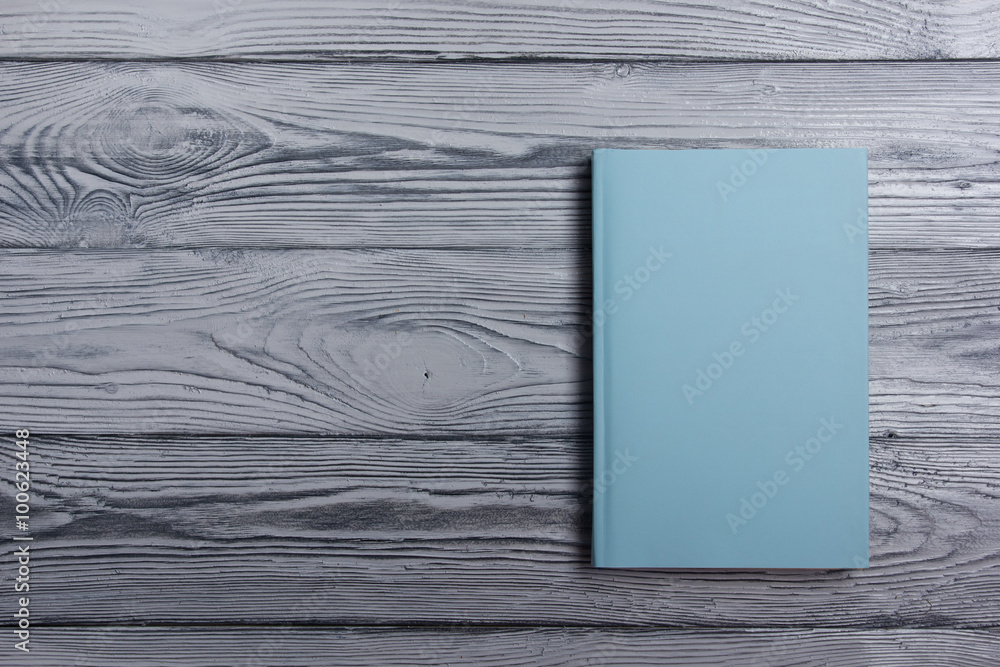 Blank book cover on textured wood background. Copy space Stock Photo ...