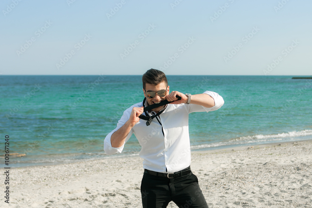 a couple young cute men at the beach, blue sky, gay wedding Stock Photo ...