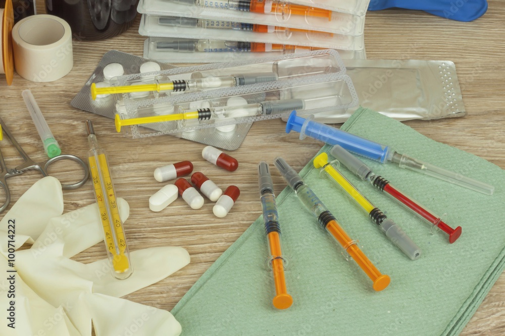 Vaccination against influenza epidemic. Syringe and Sterile Vial Filled ...