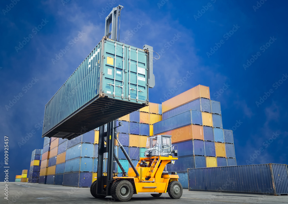 Forklift handling container box loading to freight train Stock Photo ...