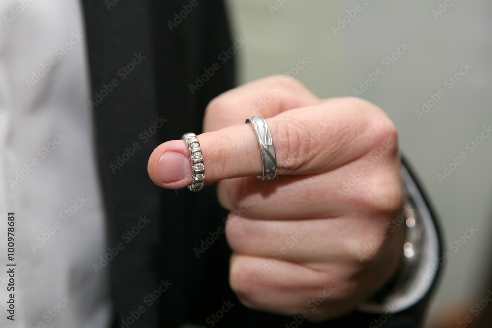 the bride wore two wedding rings on the index finger Stock Photo ...