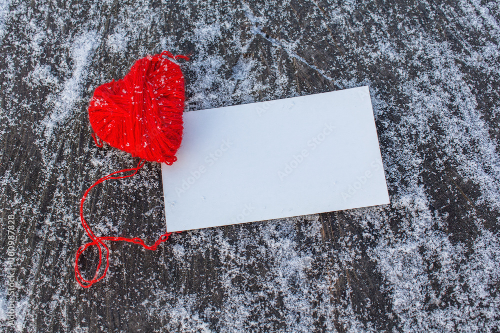 Red heart and empty card on a wooden background Stock Photo | Adobe Stock