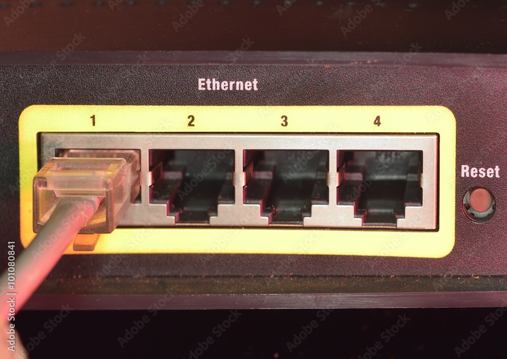 rj45 connected to socket in router Stock Photo | Adobe Stock