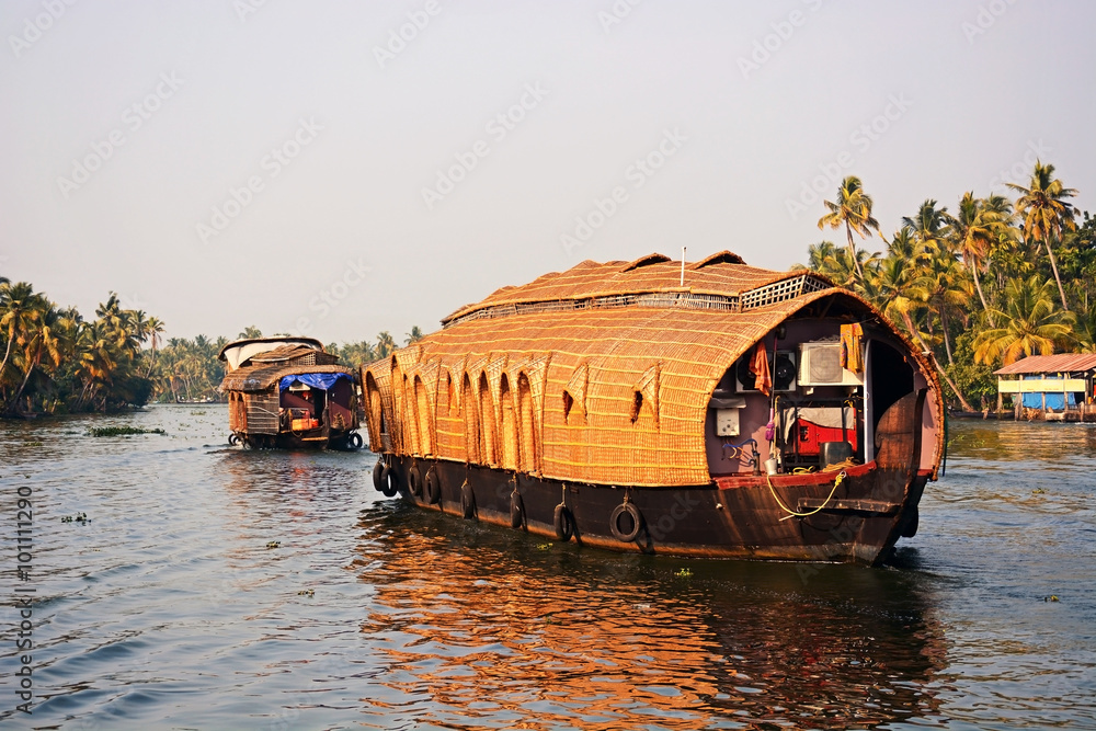 Traditional rice boat "Ketuvallam" in backwaters of Kerala , India ...
