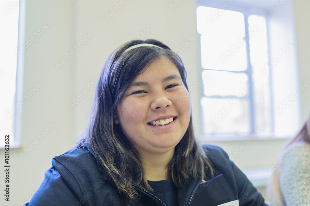 Native American student smiling in class Stock Photo | Adobe Stock