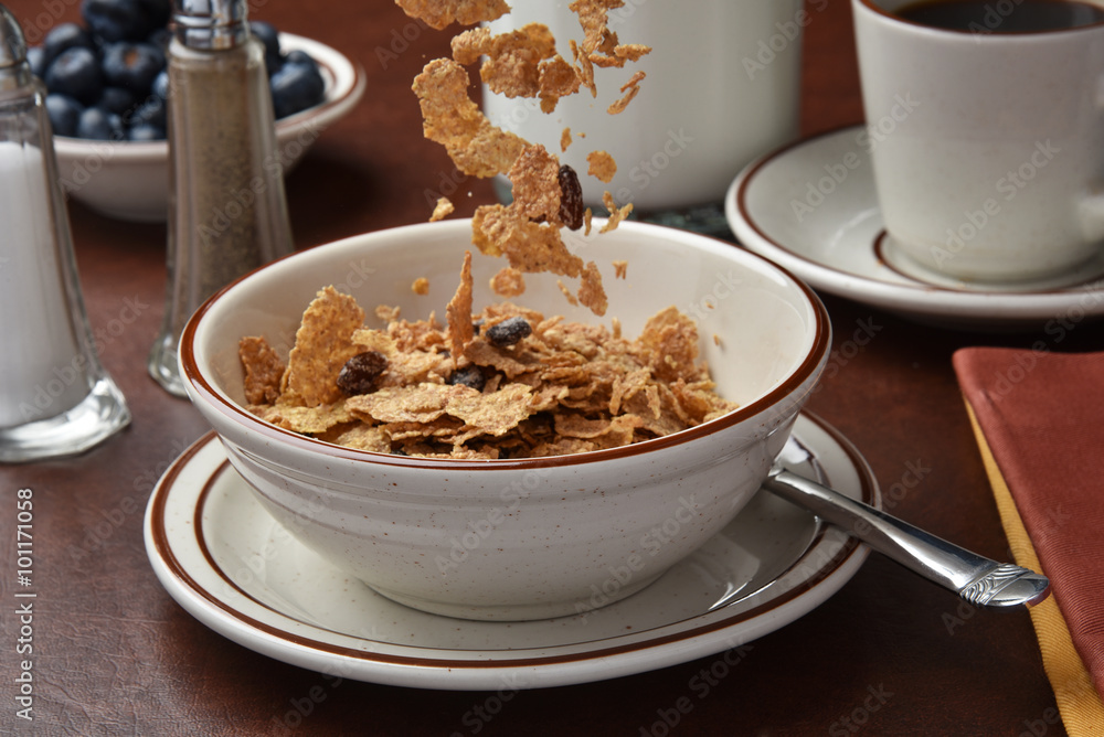 Pouring breakfast cereal Stock Photo | Adobe Stock