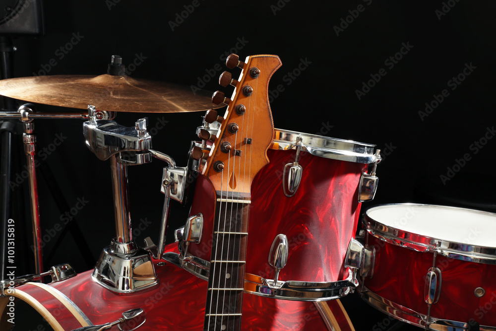 Musical instruments on a stage on dark background Stock Photo | Adobe Stock
