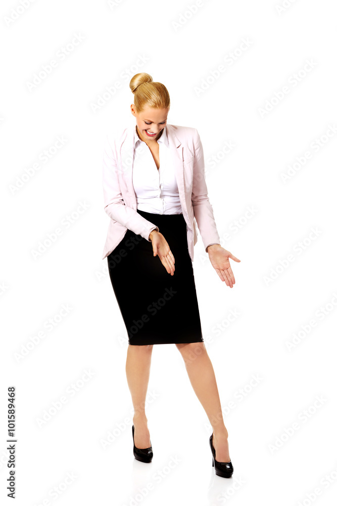 Business woman pointing down at her shoe Stock Photo | Adobe Stock