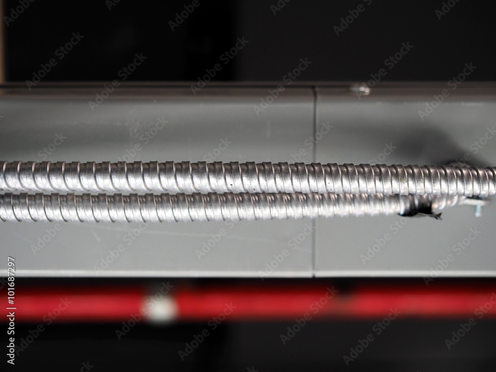 Flexible metal conduit connected to metal wire way bottom view Stock ...