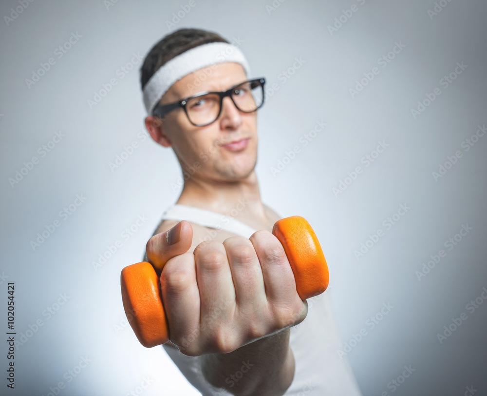Weak Man Lifting Weights