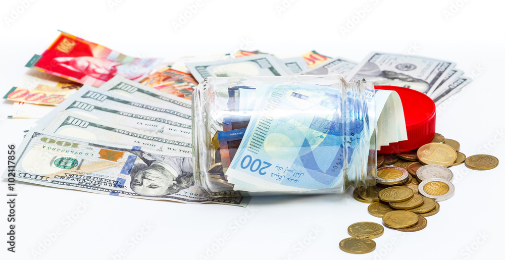 glass jar of pile of New Israeli Shekels banknotes with the new 200 NIS ...