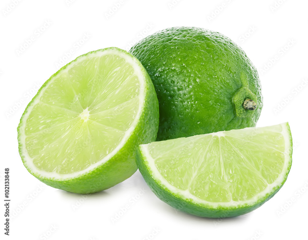 Lime. Whole lime with slices isolated on white background, with ...