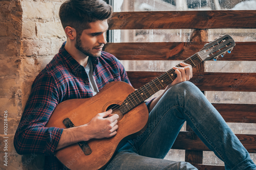 Talented guitarist. Photos | Adobe Stock